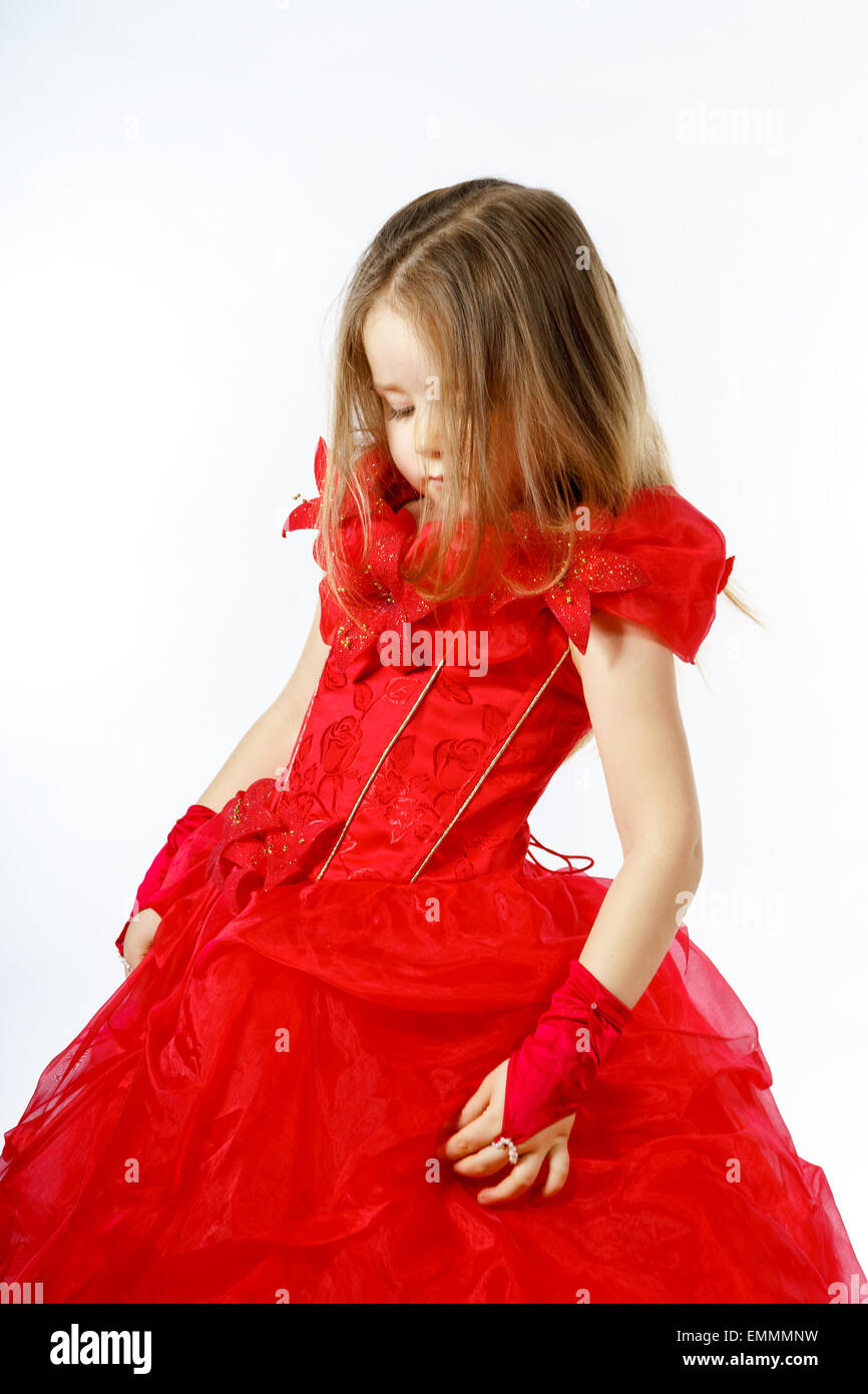 Cute little princess dressed in red dancing. Isolated on white ...