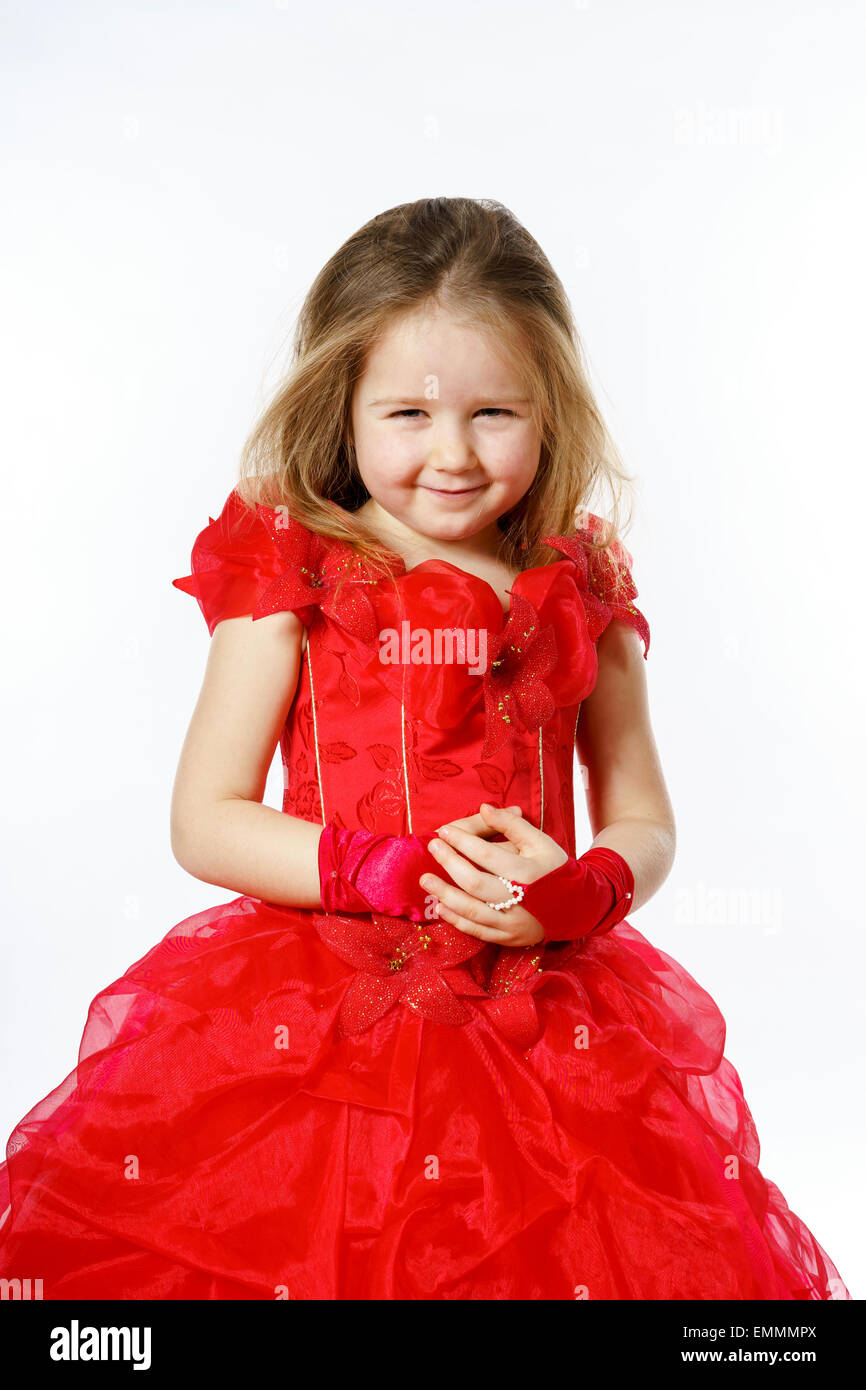 Cute little princess dressed in red dancing. Isolated on white ...