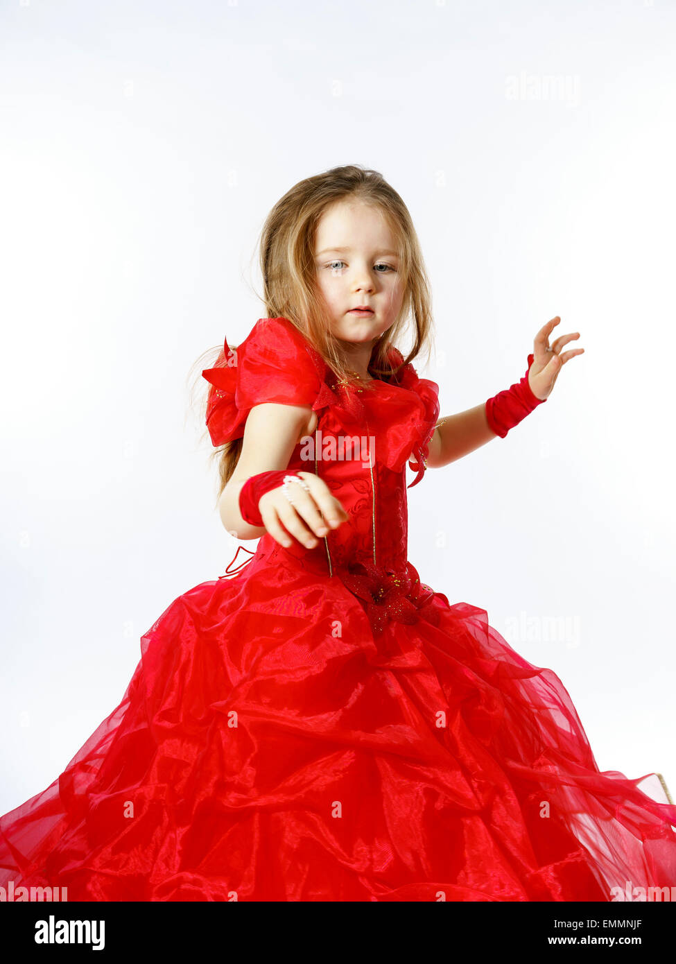 Cute little princess dressed in red dancing. Isolated on white ...