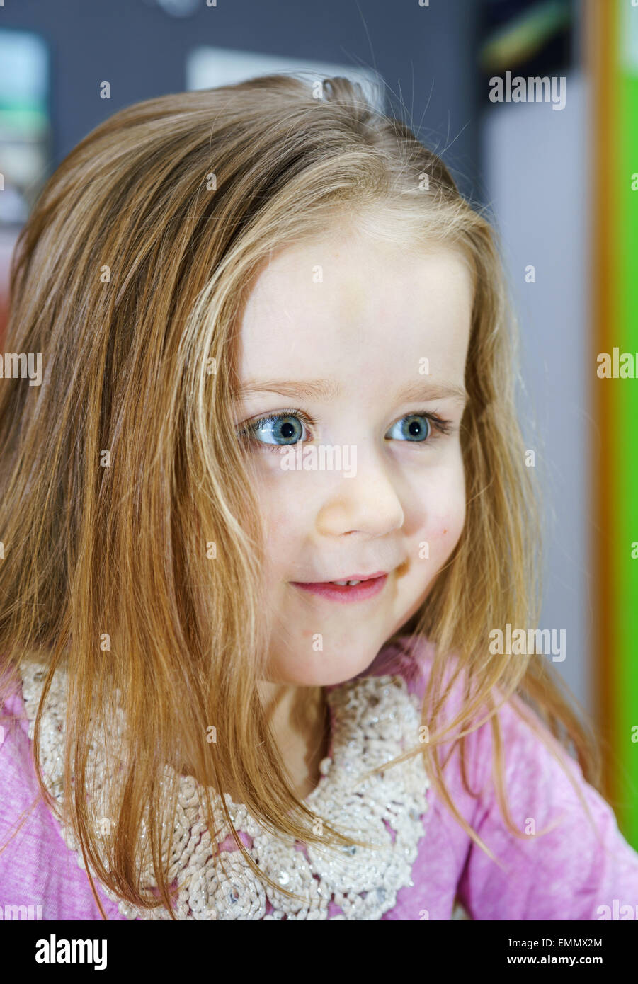 Cute little girl studing to speaking and writing letters at home lesson ...