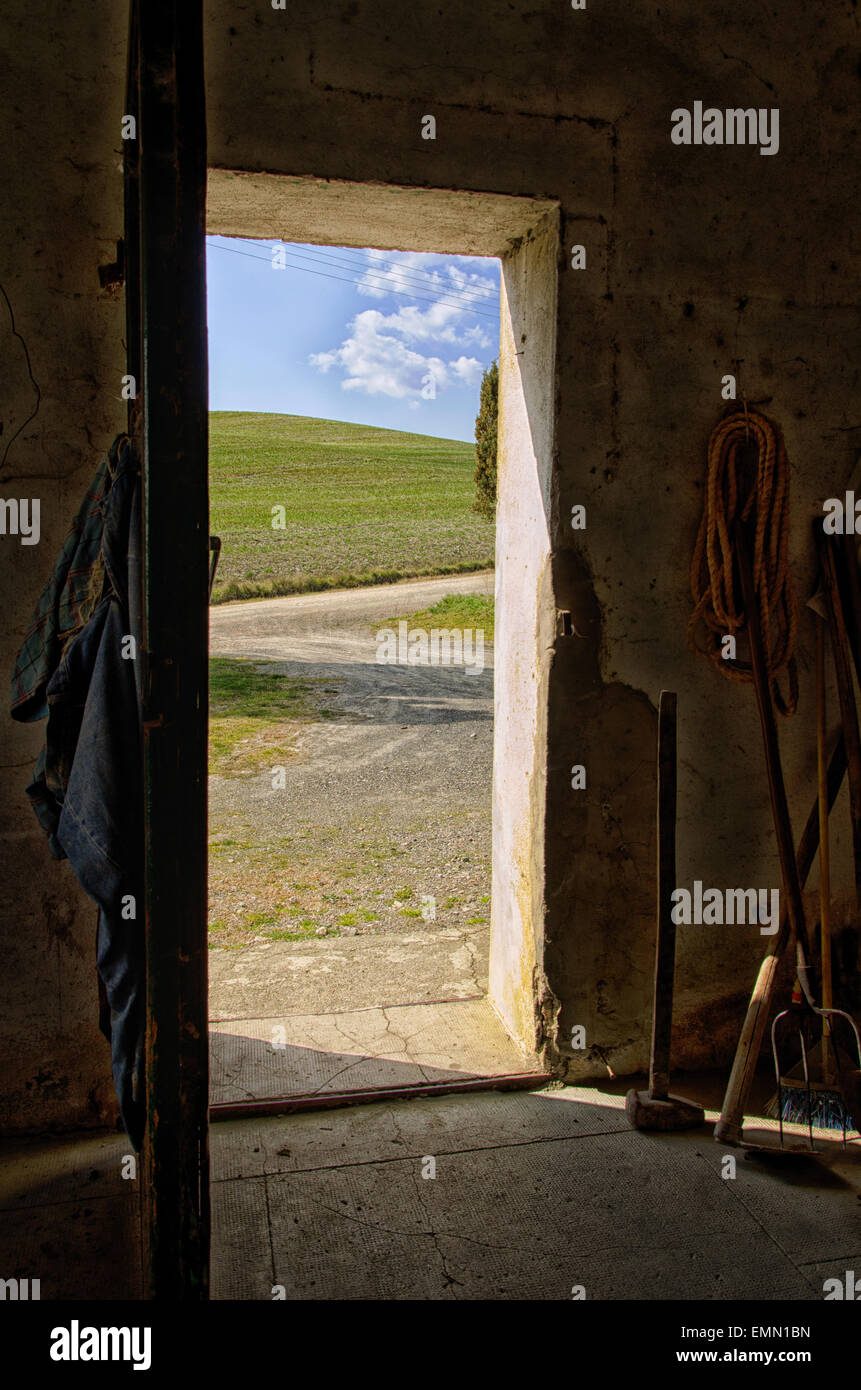 Door of farm open to the countryside Stock Photo - Alamy