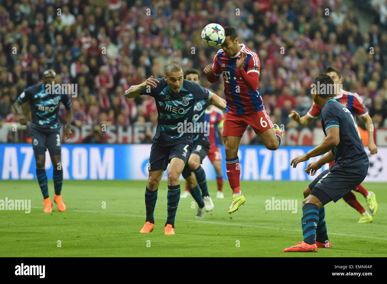 Munich, Germany. 21st Apr, 2015. Munich's Thiago Alcantara (C) in ...