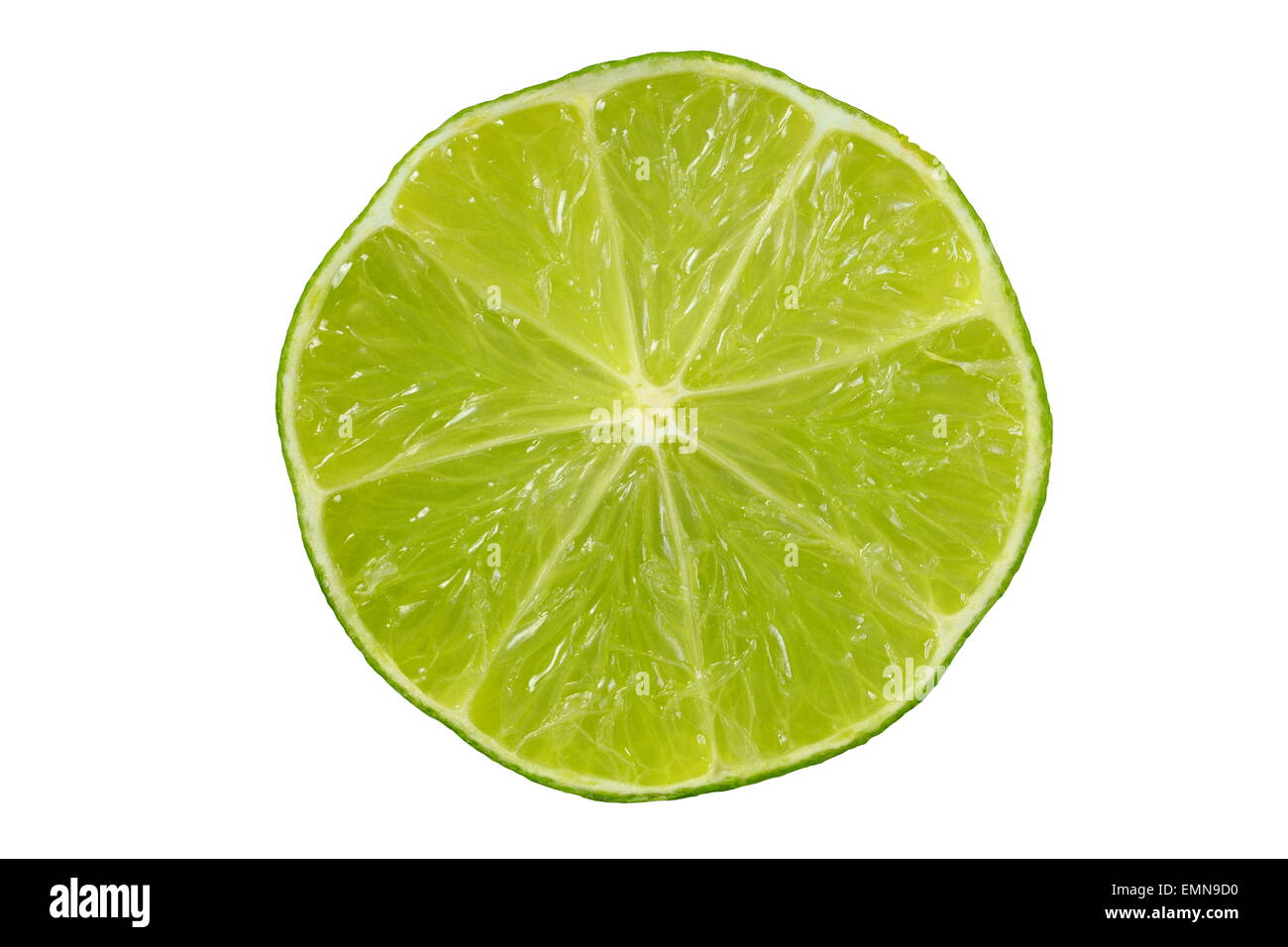 Lime slice isolated on white background Stock Photo - Alamy