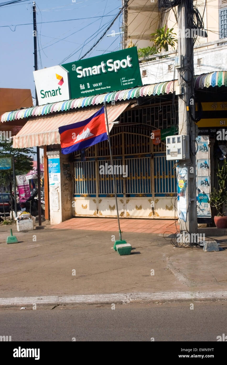 A Cambodian flag flies in front of a closed phone shop during the Khmer ...