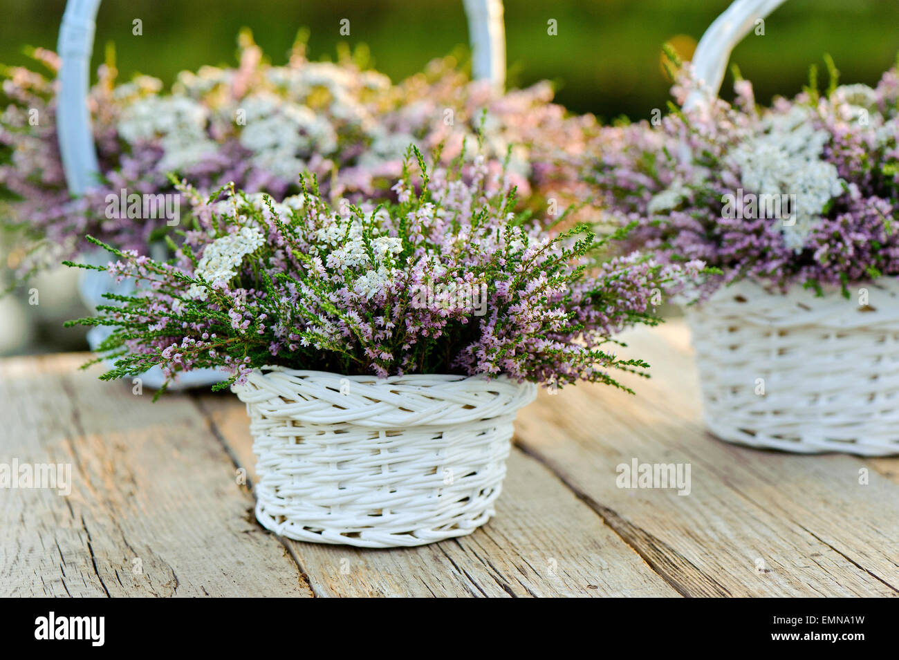 Bouquets of flowers in baskets Stock Photo - Alamy