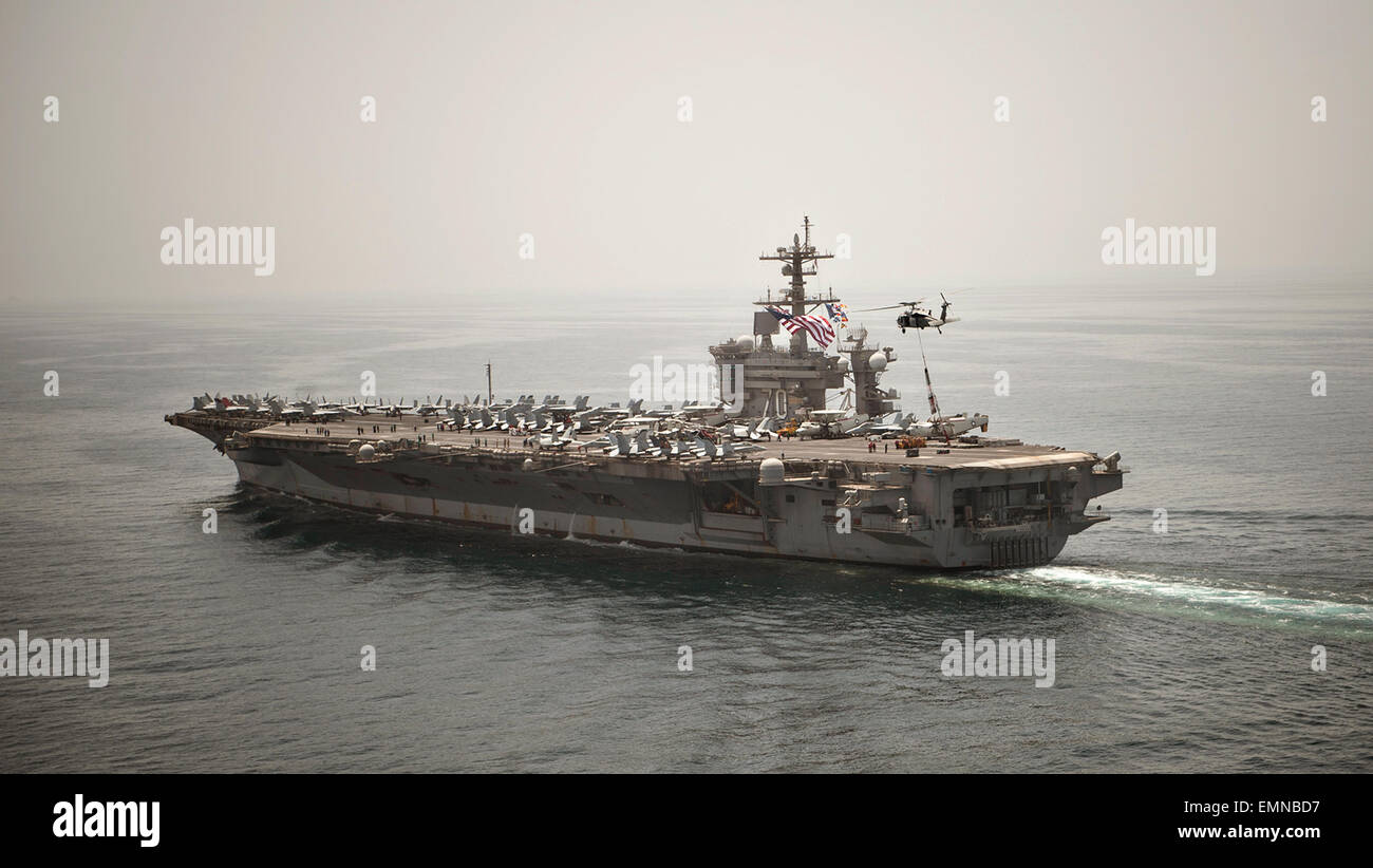US Navy Nimitz-class aircraft carrier USS Theodore Roosevelt during a replenishment at sea while ...