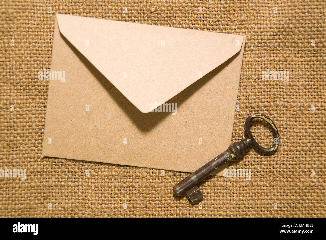 Vintage key and envelope for letters on the old cloth Stock Photo - Alamy