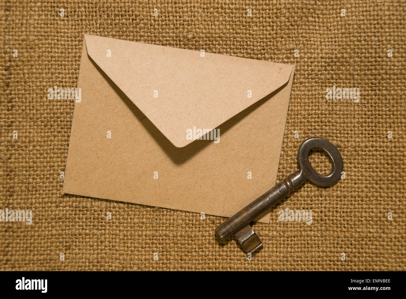 Vintage key and envelope for letters on the old cloth Stock Photo - Alamy