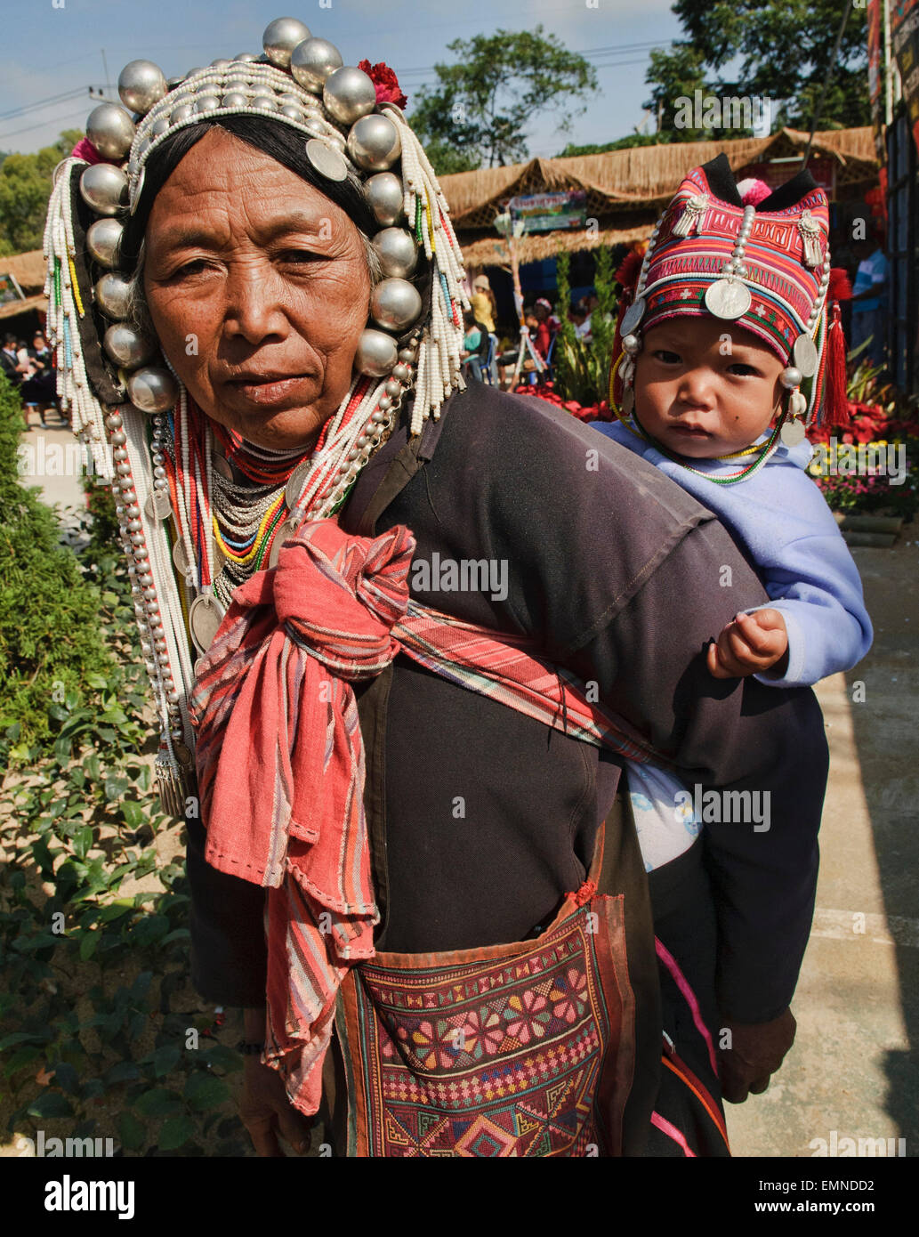 Portrait of an Akha woman with her son during a festival in Doi Mae ...