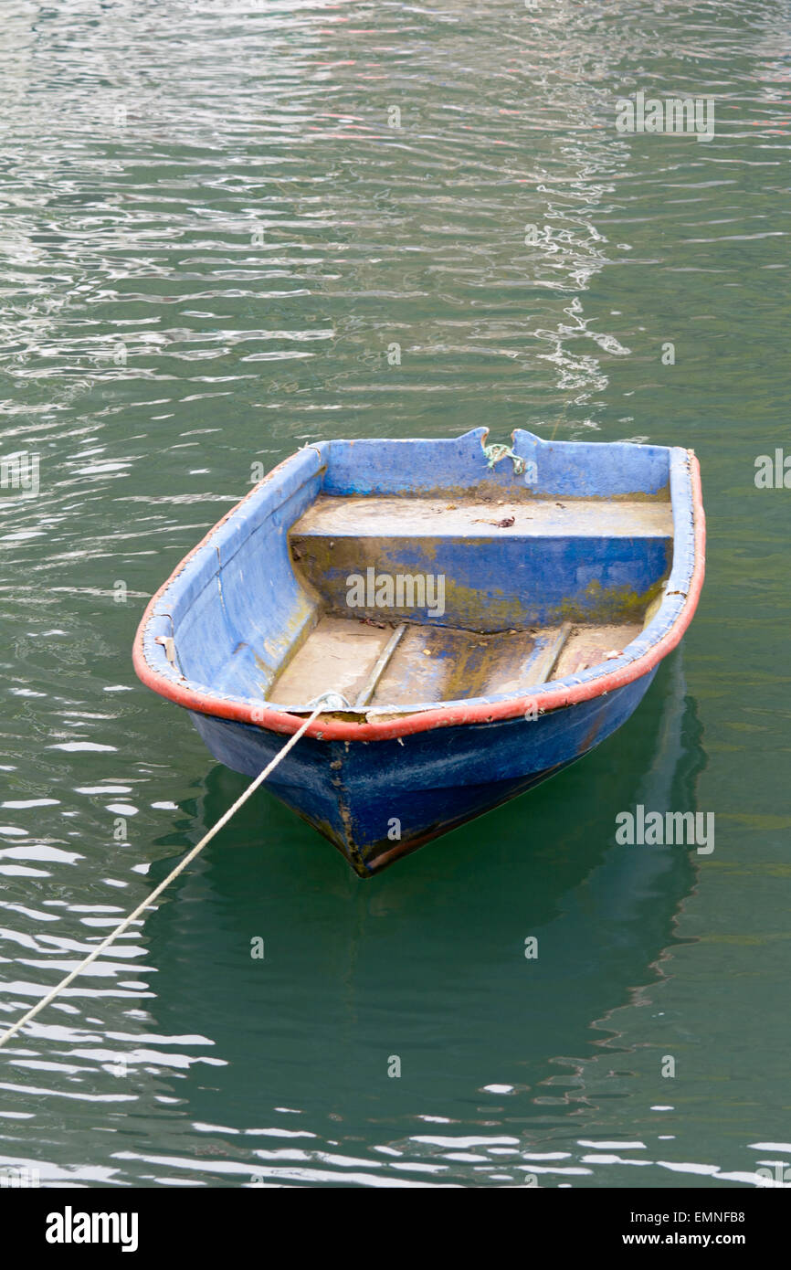 Small blue row boat in Polperro harbour, Cornwall, England Stock Photo ...