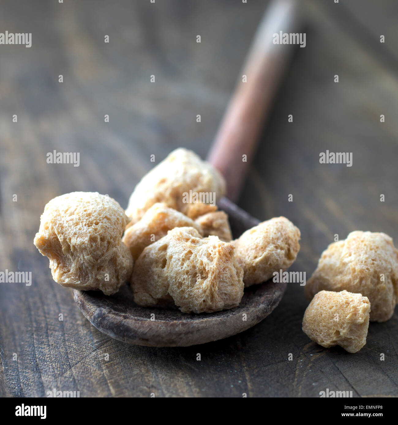 Raw Soya Chunks (Soy Meat) on wooden table, close up Stock Photo - Alamy