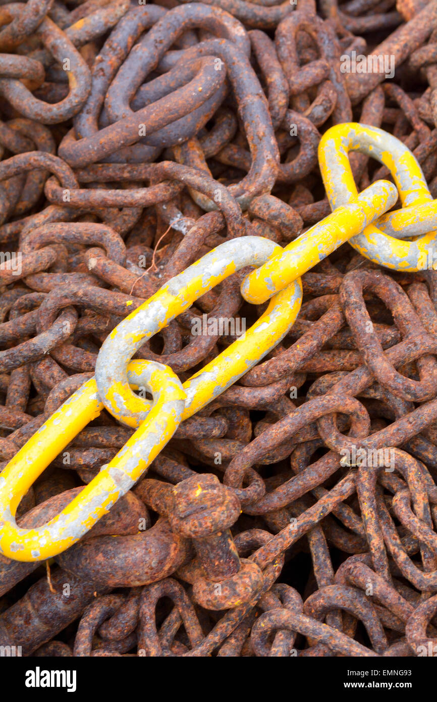 Yellow chain in box with rusted chain of fishing boat net chain Stock ...