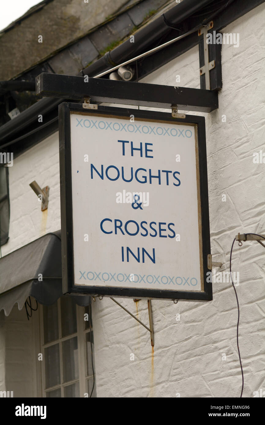 Noughts and Crosses Inn sign at Polperro, Cornwall, England Stock Photo ...