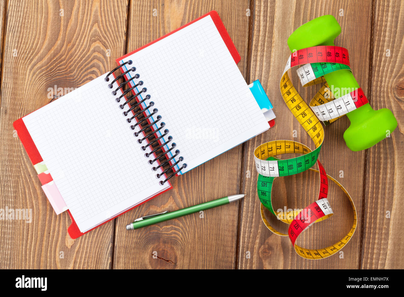Dumbells, tape measure and notepad for copy space. Fitness and health ...