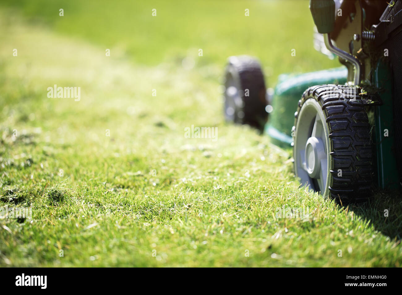 Cutting long grass in garden hi-res stock photography and images - Alamy