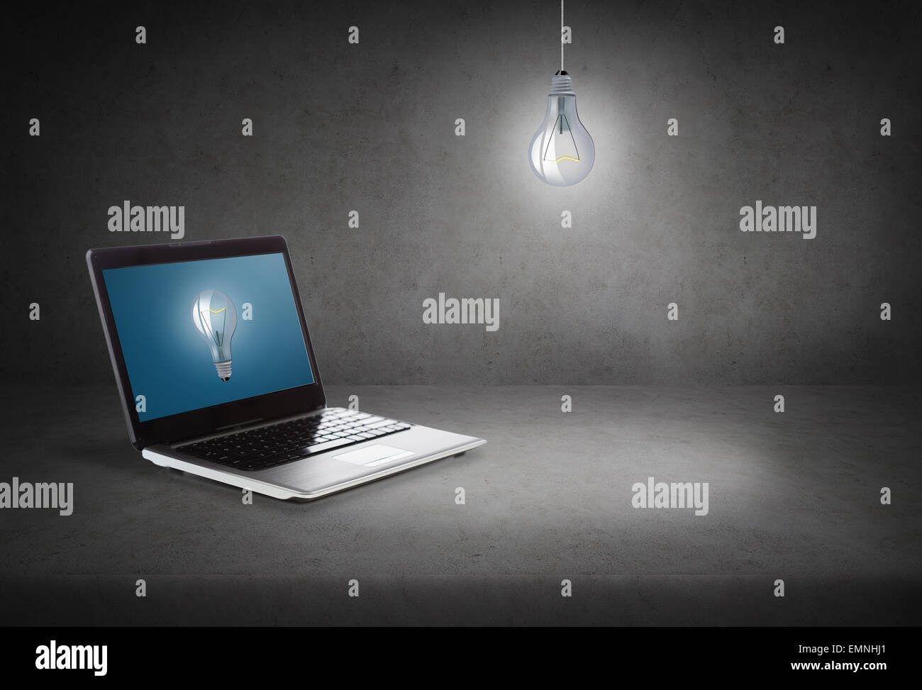 laptop computer with light bulb on screen Stock Photo - Alamy