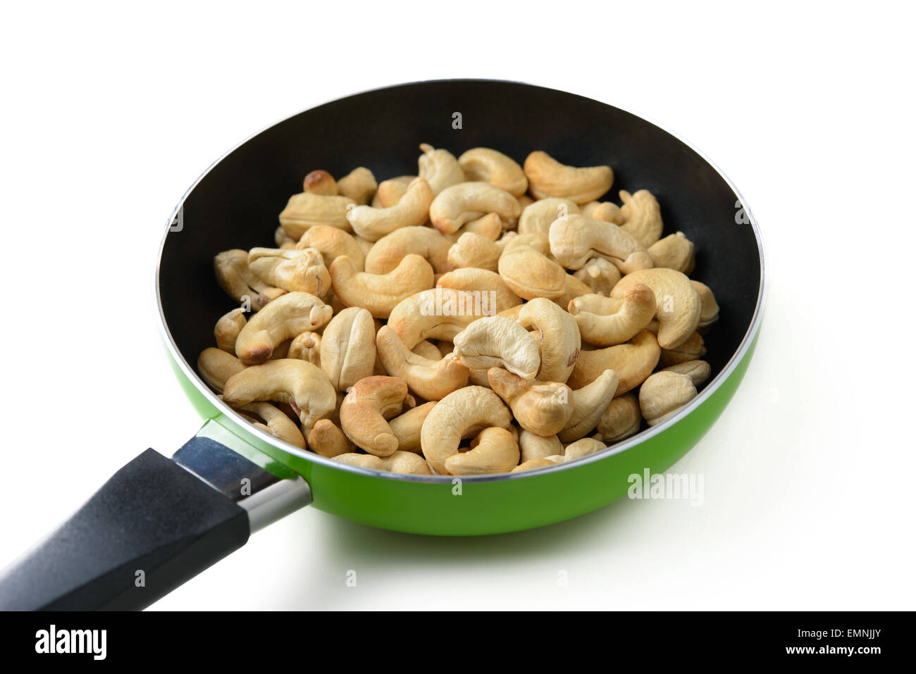 Fried cashew nuts in pan Stock Photo - Alamy