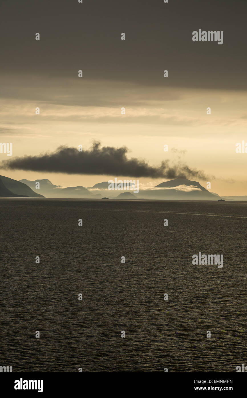 low sea mist on distant islands in the Norwegian Sea Stock Photo - Alamy