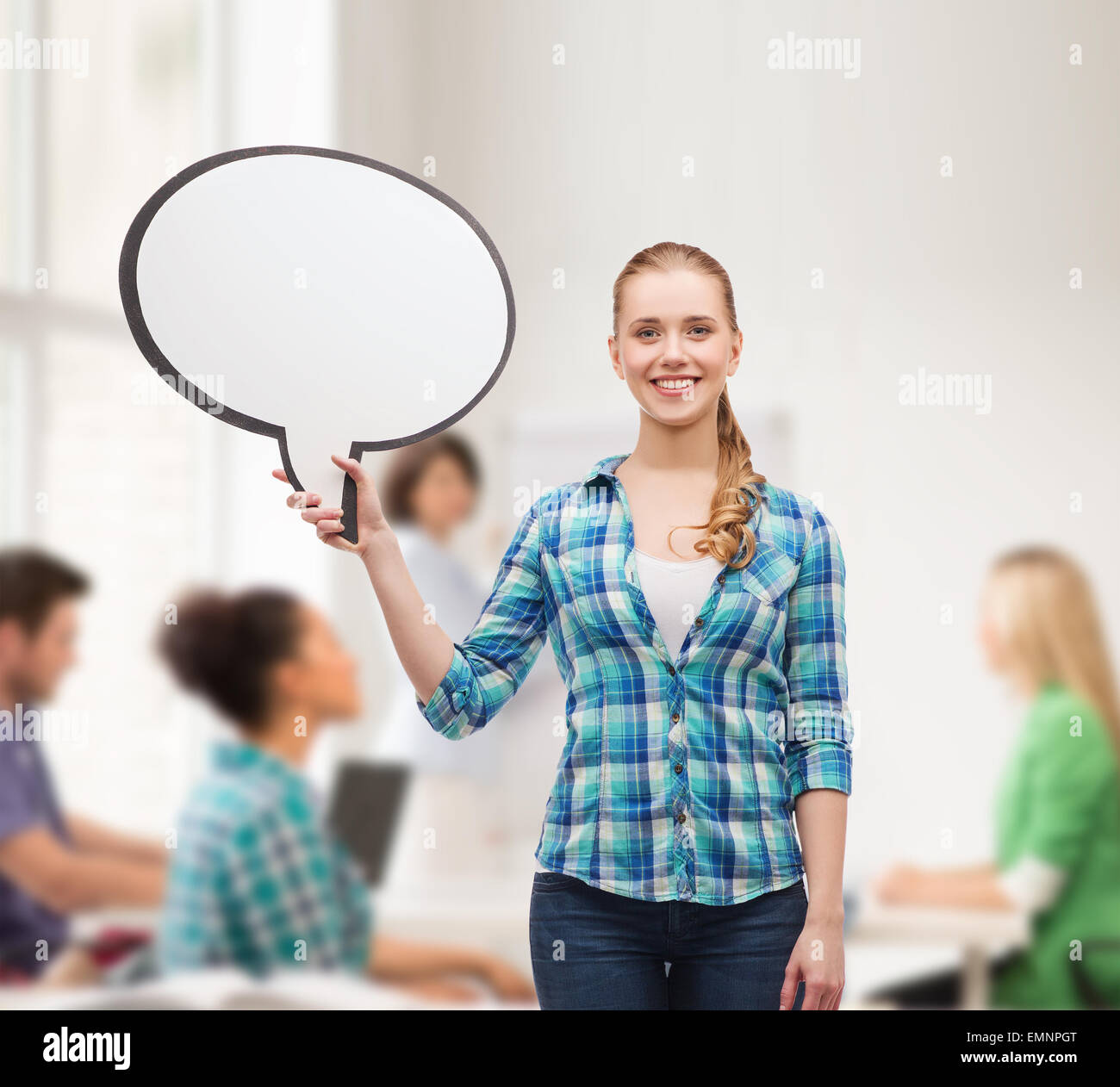 smiling young woman with blank text bubble Stock Photo - Alamy
