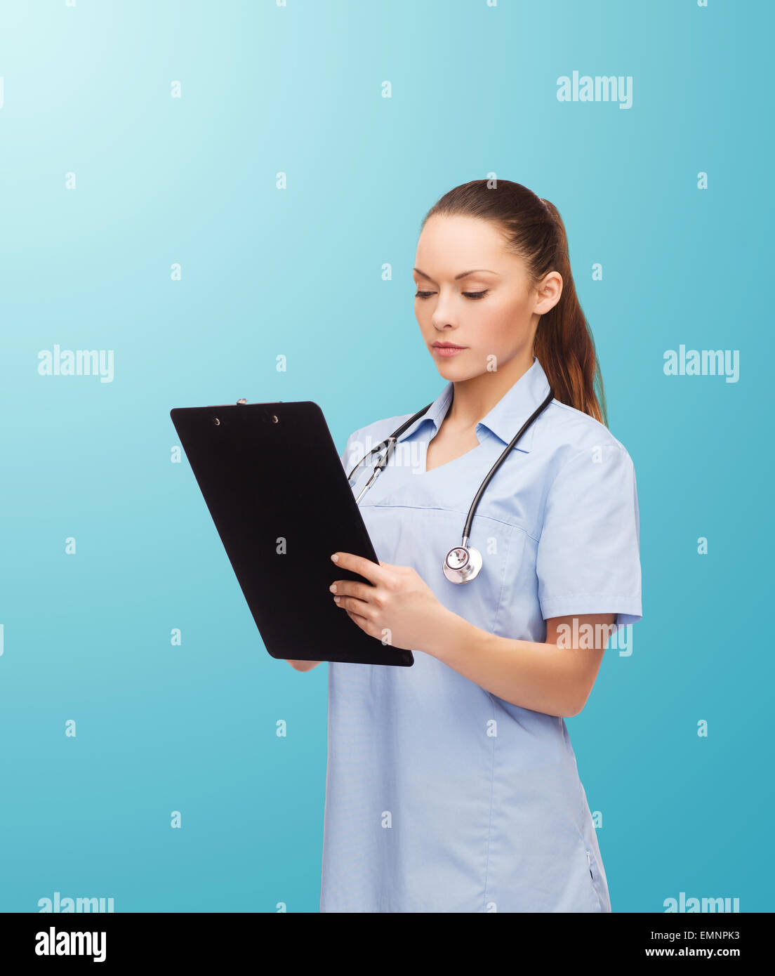 serious female doctor or nurse with stethoscope Stock Photo - Alamy