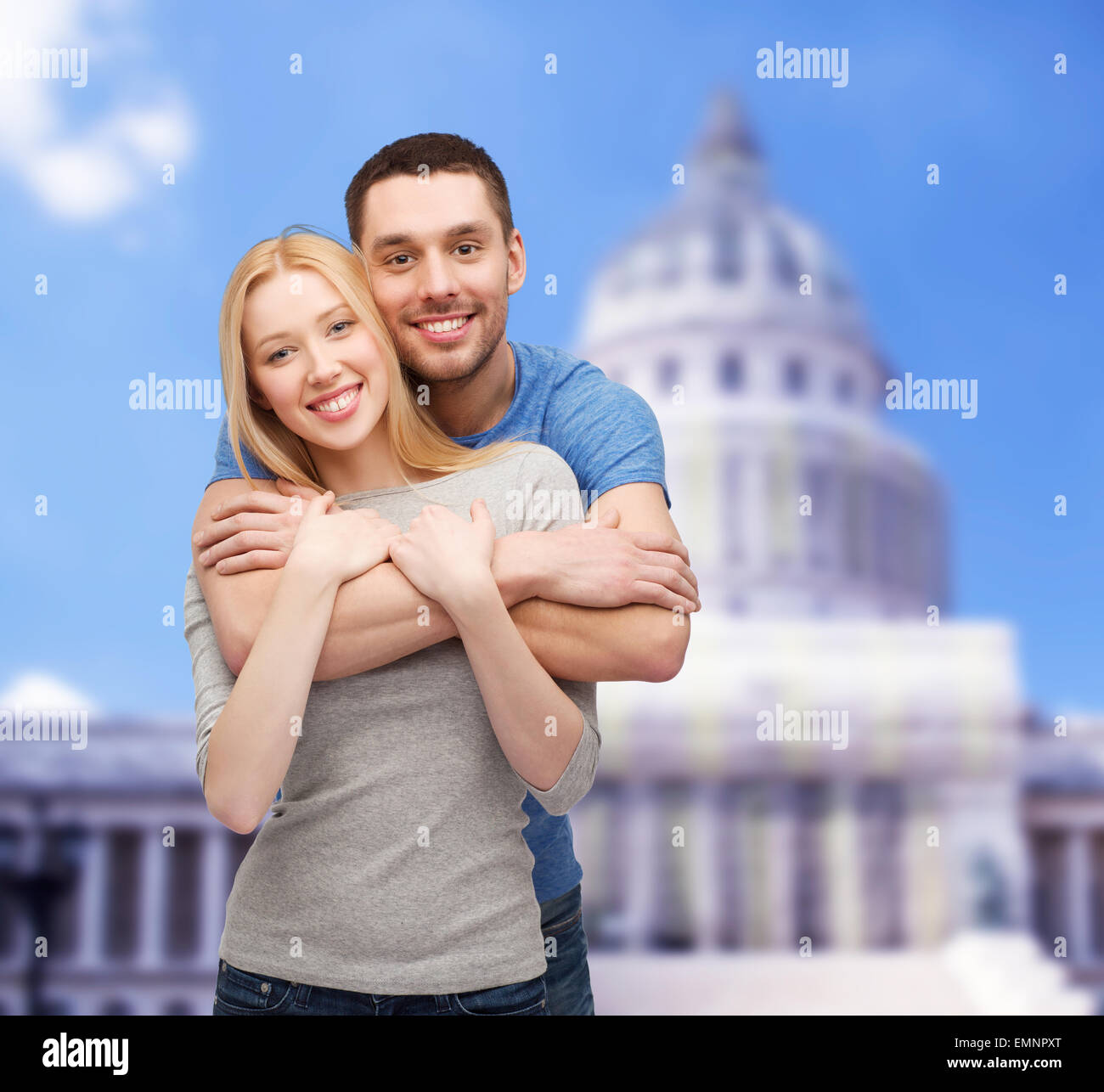 smiling couple hugging Stock Photo - Alamy