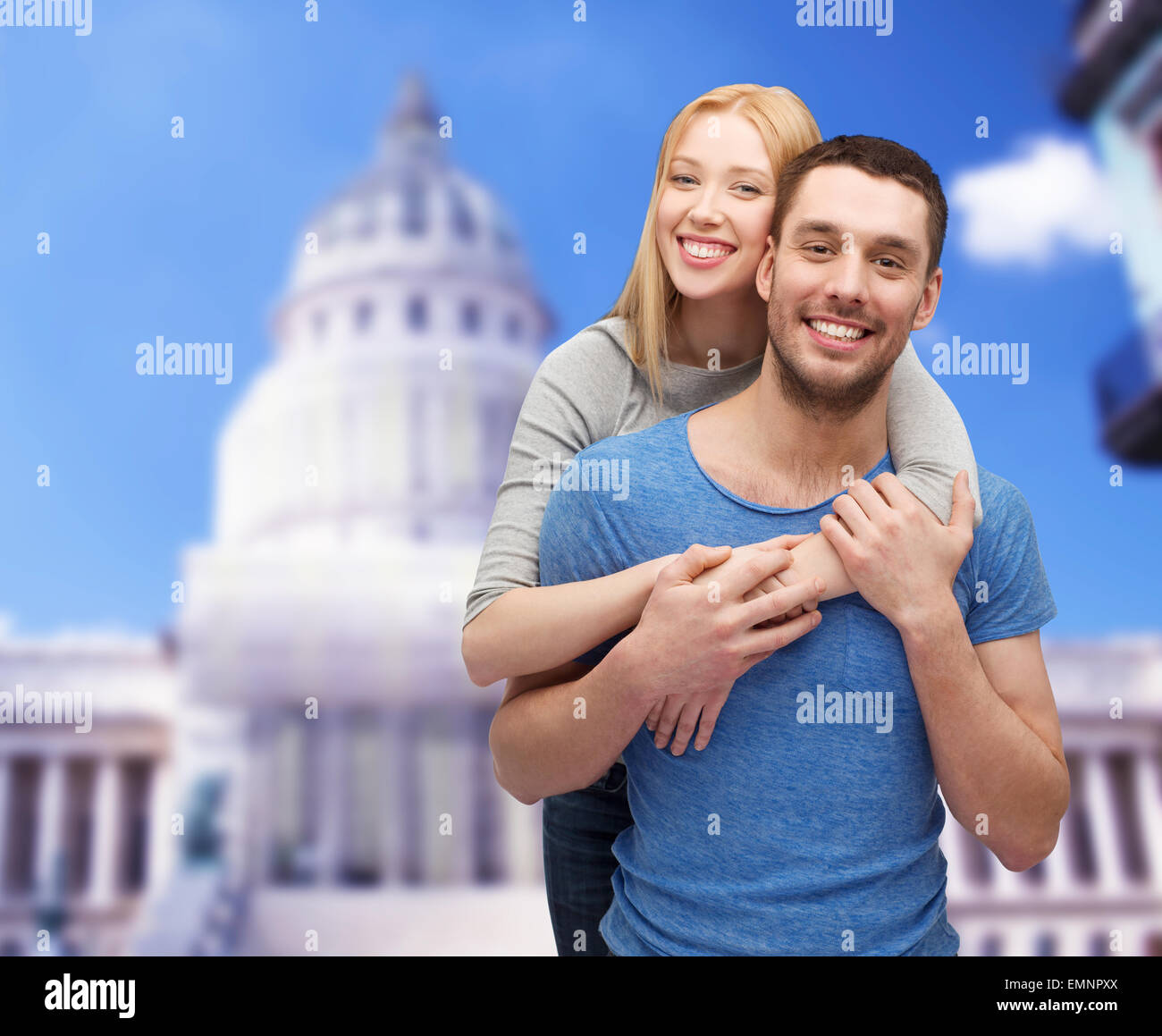 smiling couple hugging Stock Photo - Alamy