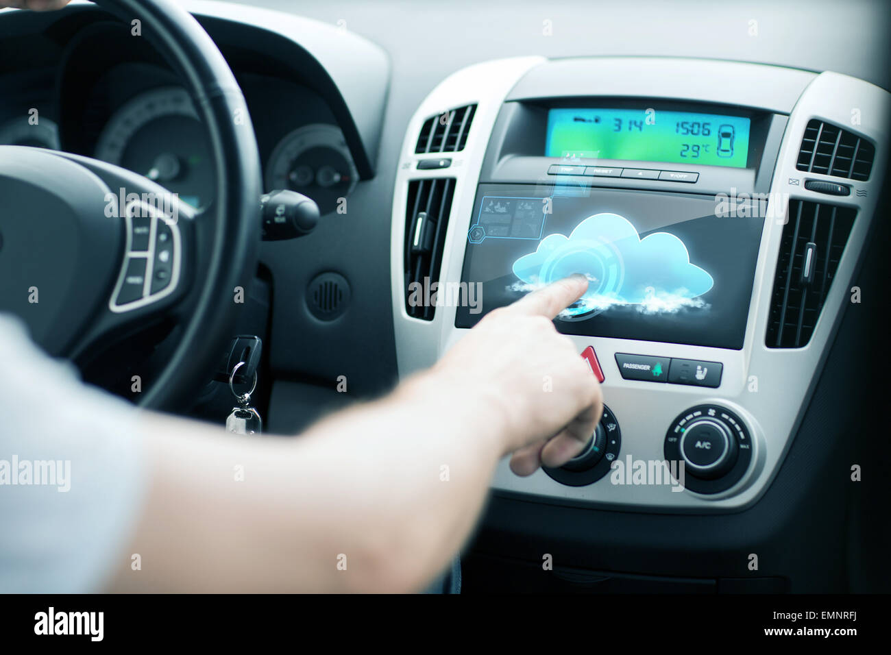 man using car control panel Stock Photo - Alamy