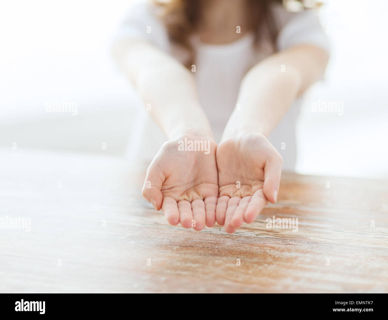 close up of little girl showing empty cupped hands Stock Photo - Alamy