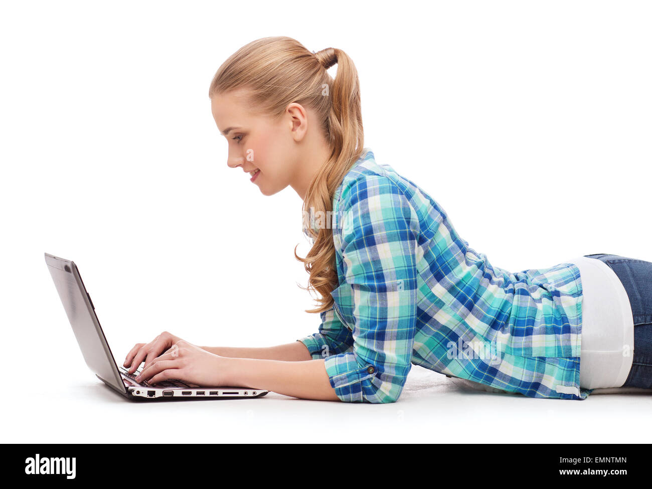 Woman lying on floor laptop hi-res stock photography and images - Alamy