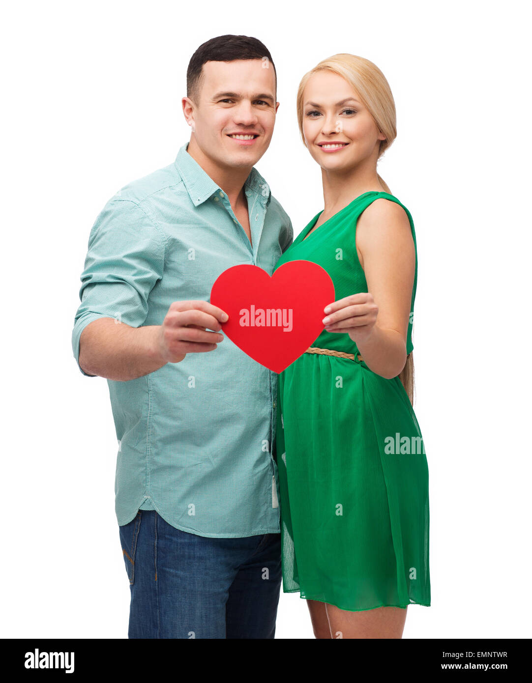 smiling couple holding big red heart Stock Photo - Alamy