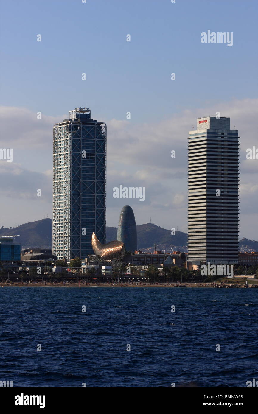 Two high rise buildings and a Golden Fish sculpture on Mediterranean ...