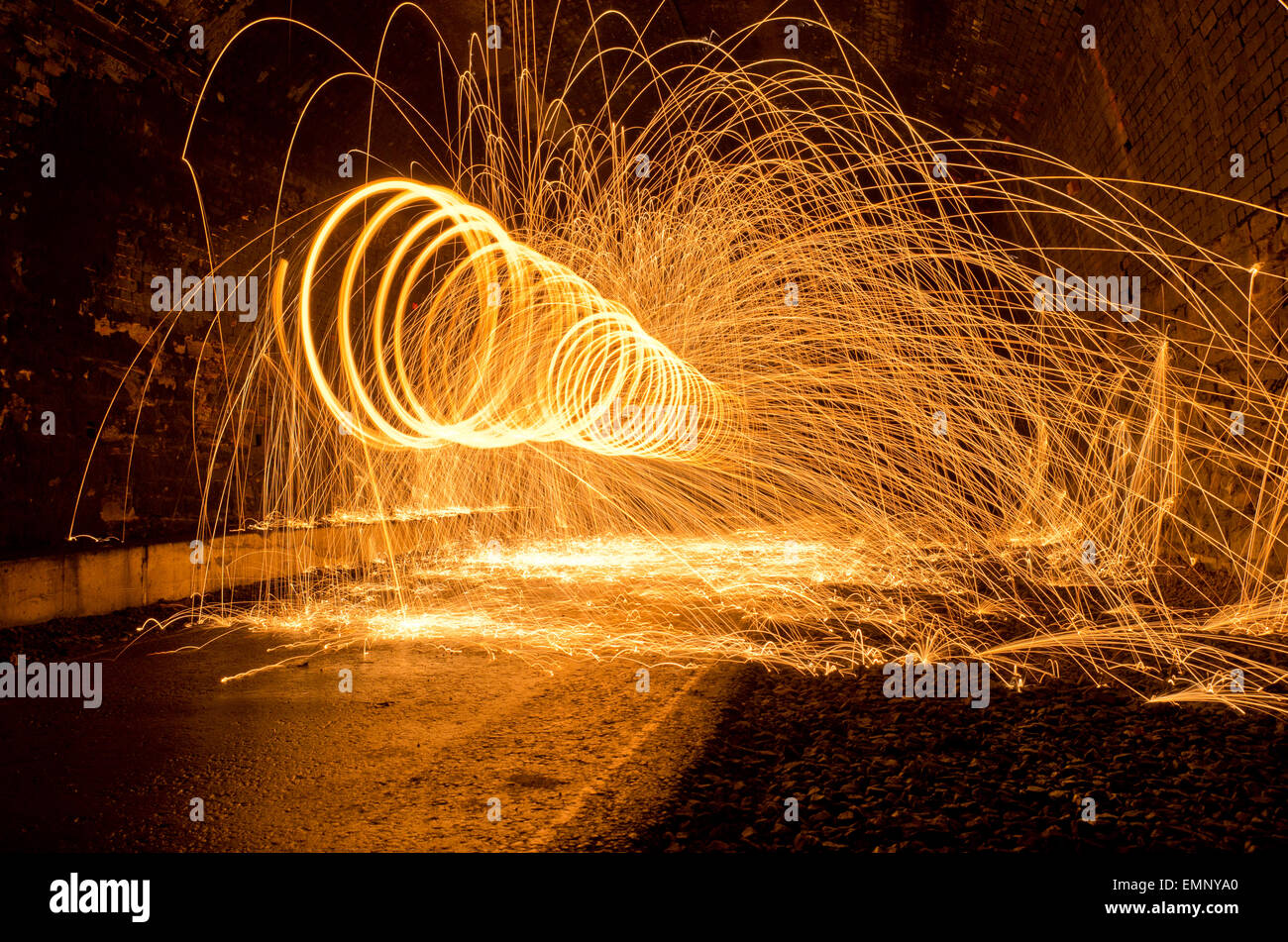 Sparks in train tunnel Stock Photo - Alamy