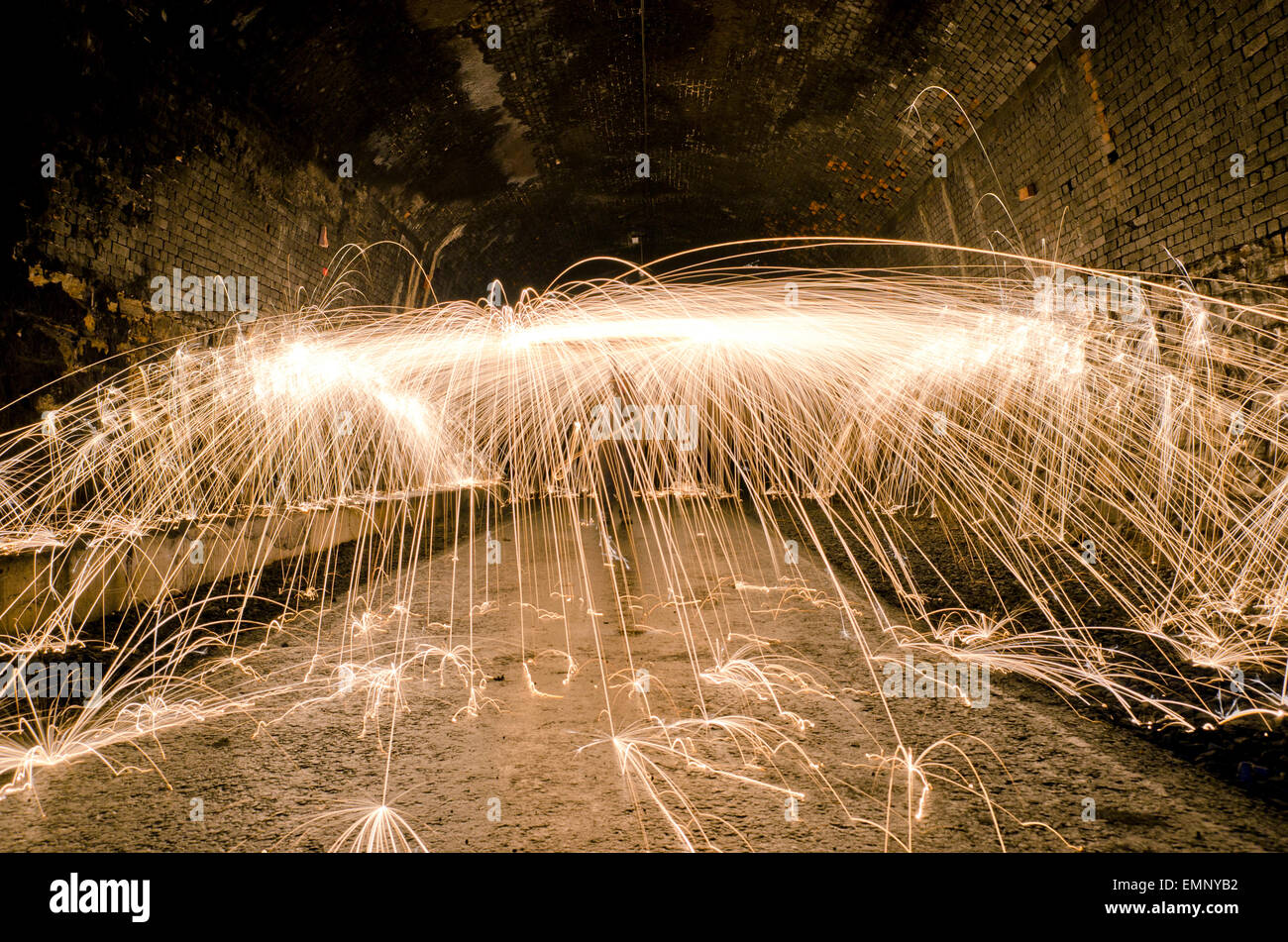 Sparks in train tunnel Stock Photo - Alamy