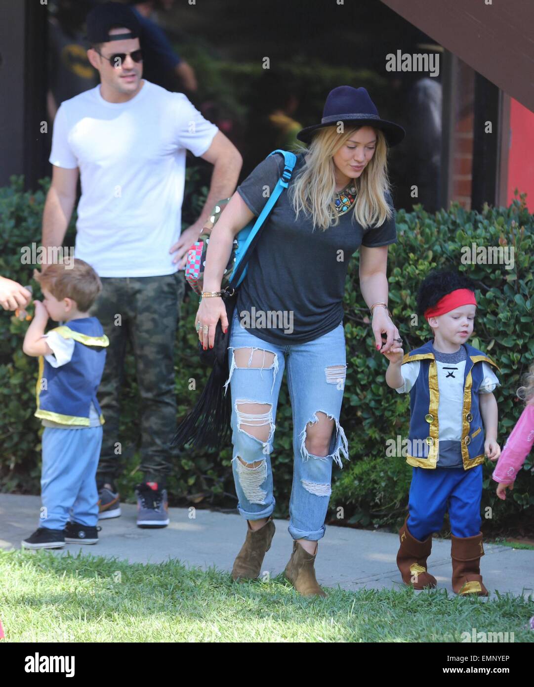 Hilary Duff, Mike Comrie, and their son Luca Comrie arrive at Luca's ...