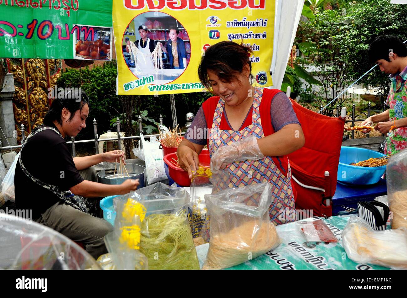 Bangkok, Thailand: Family workers selling freshly made noodles at their ...