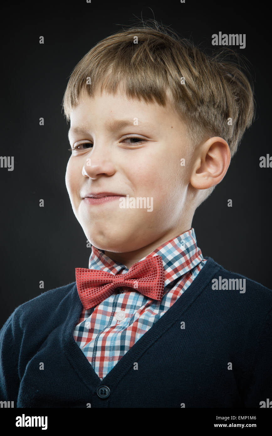 close up portrait of a smiling handsome smug boy Stock Photo - Alamy