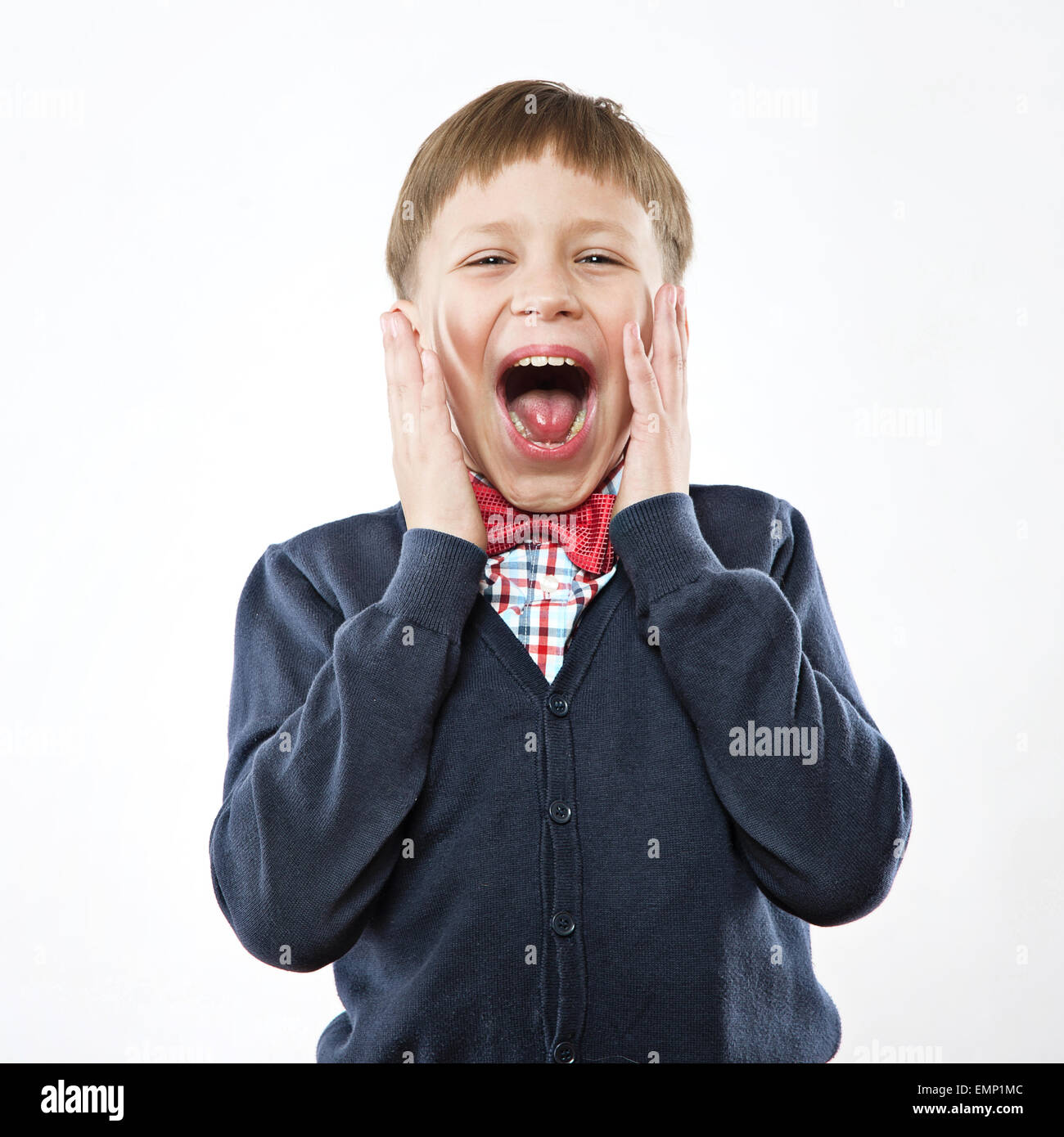 boy shouting loudly. studio shot, white background Stock Photo - Alamy