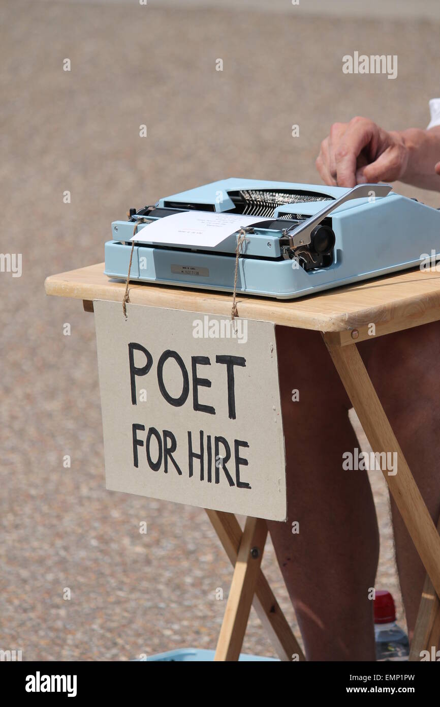Poet for hire wanted with typewriter rent writer Stock Photo - Alamy