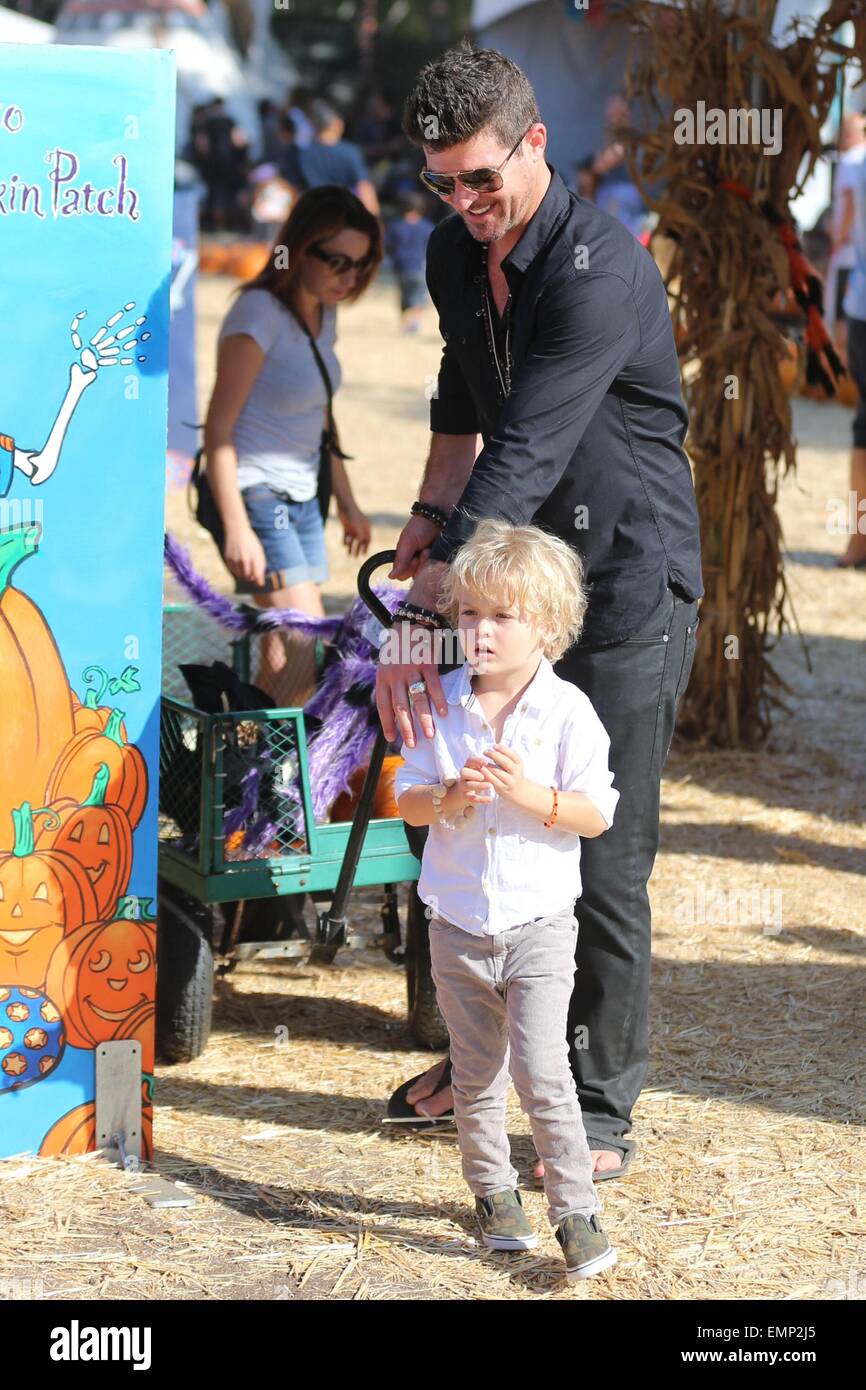 Robin Thicke arrives at Mr Bones pumpkin patch with his son. Featuring ...