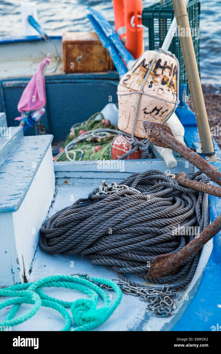 Traditional fishing tackle in a small wooden boat Stock Photo - Alamy