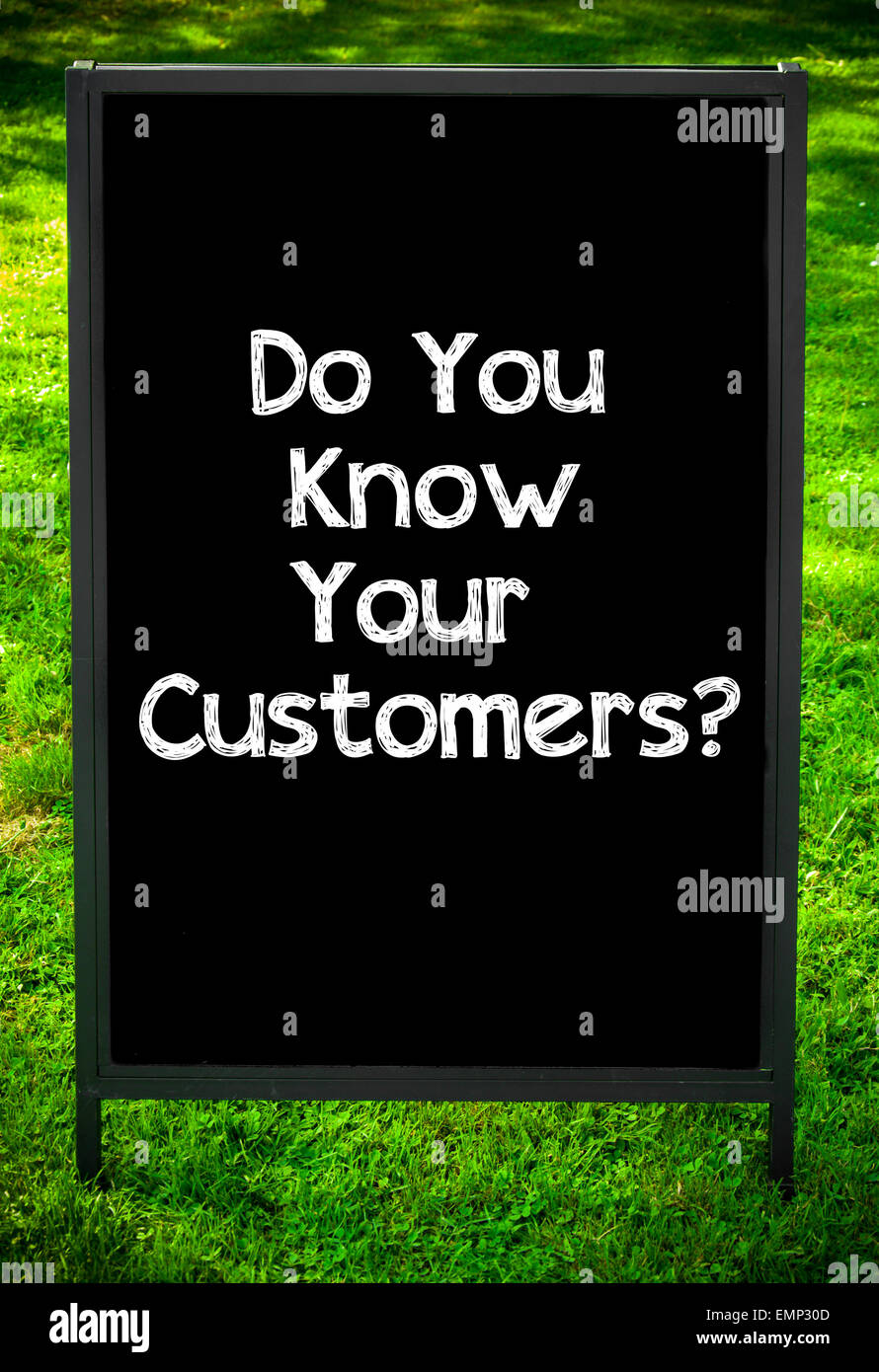 DO YOU KNOW YOUR CUSTOMERS? message on sidewalk blackboard sign against ...