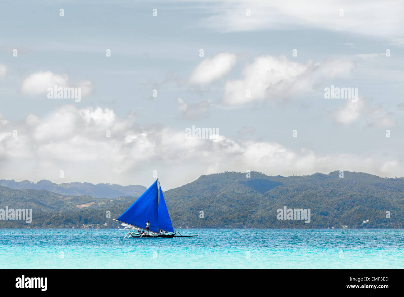 Blue sailing boat on blue sea Philippines Boracay island Stock Photo ...