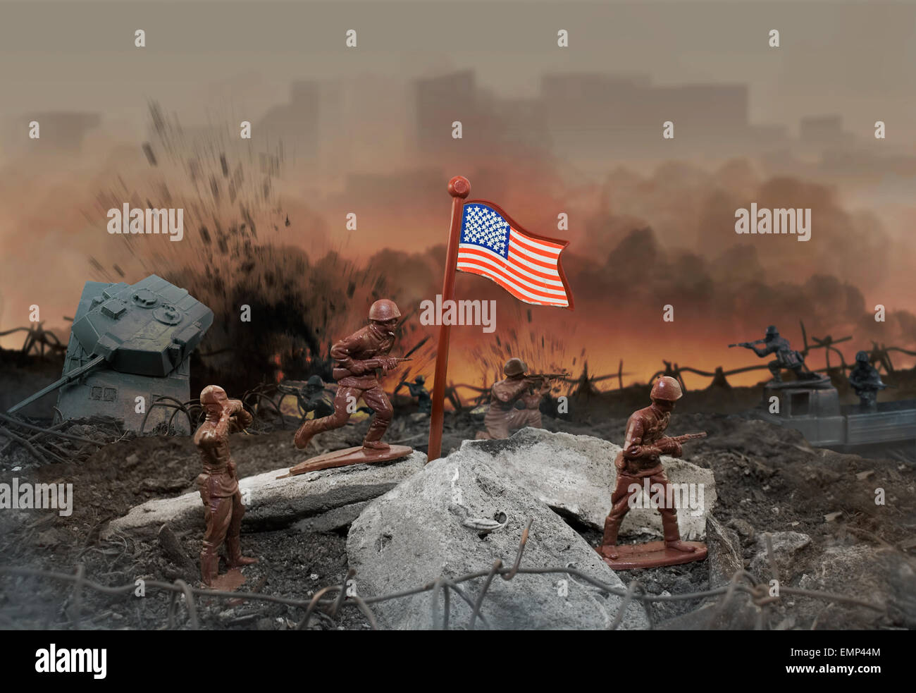 Toy war zone. Plastic toy war scene with soldiers, weapons, explosions ...