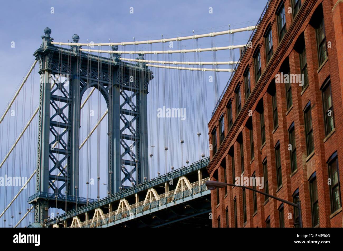 Manhattan Bridge and red brick building Stock Photo - Alamy