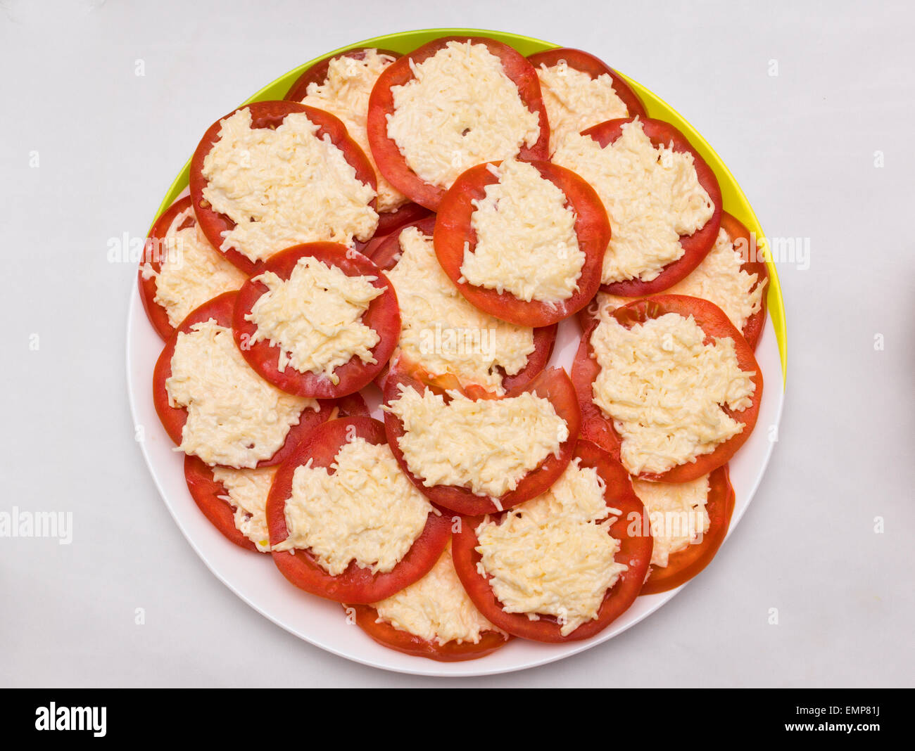 Tomatoes cut by rings with cheese and garlick paste. Fine snack Stock ...