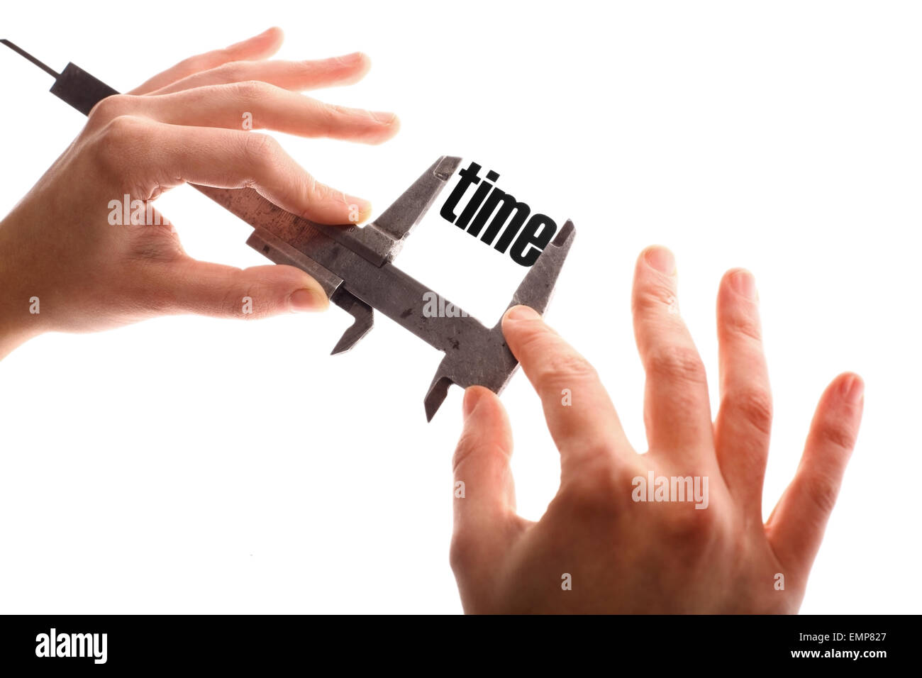 Color horizontal shot of two hands holding a caliper and measuring the ...