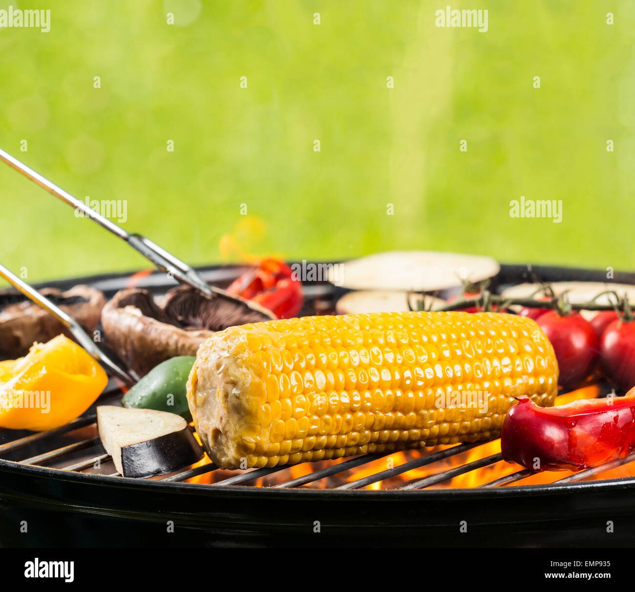 Grilled vegetable on fire Stock Photo - Alamy
