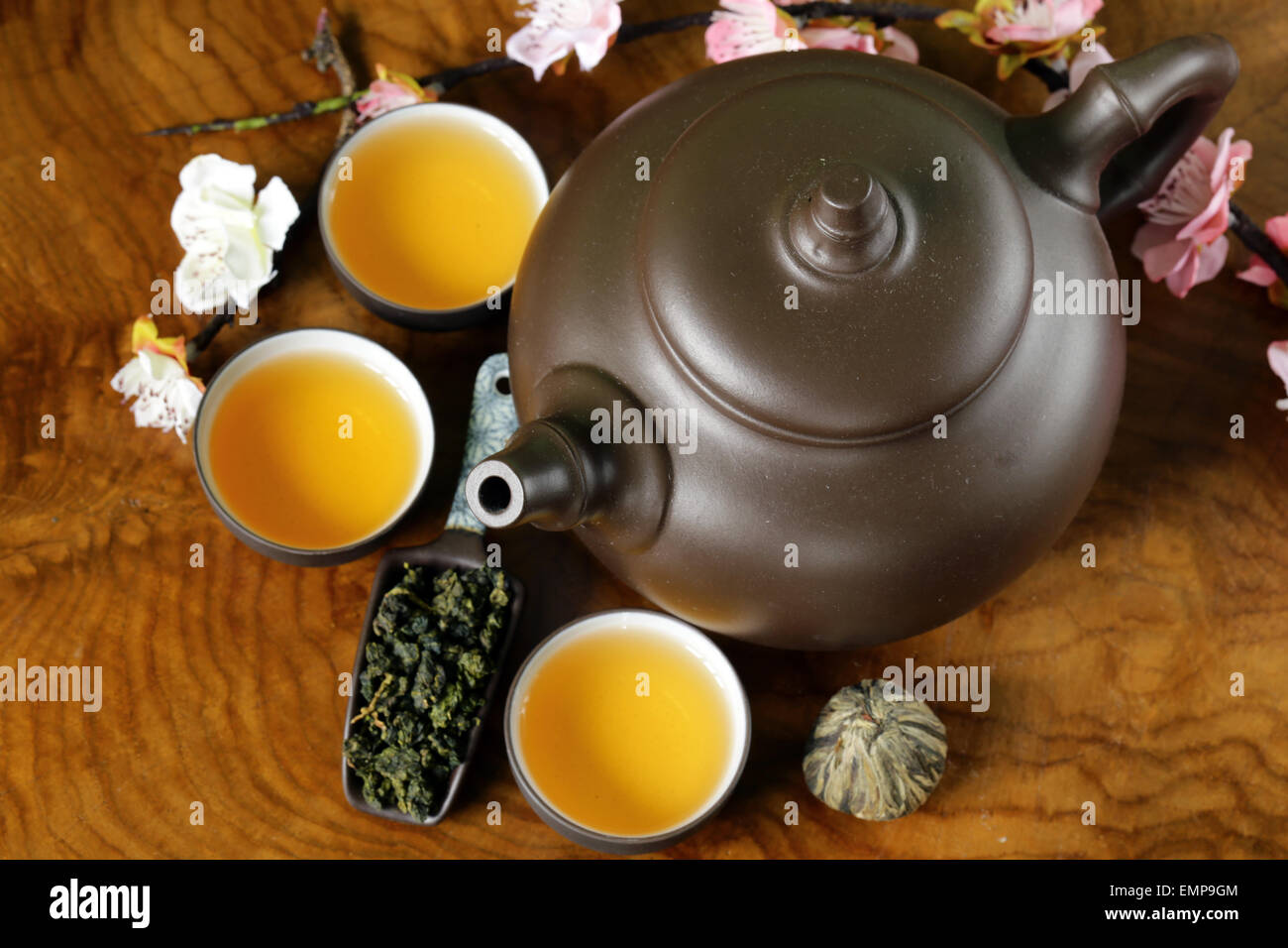 tea set (teapot, cups and different green tea Stock Photo - Alamy