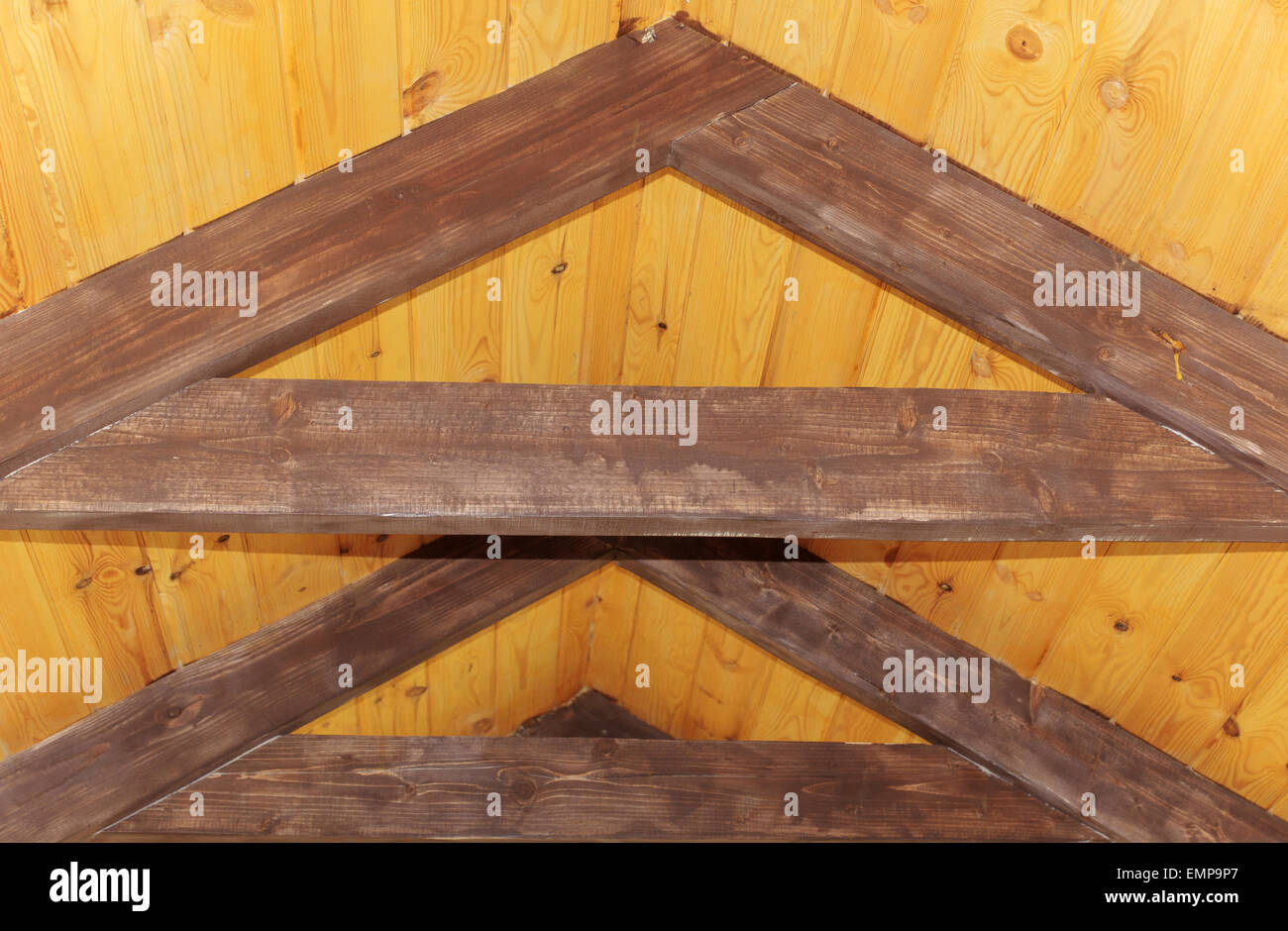 Brown rafters made of wooden bars for roof maintenance Stock Photo - Alamy