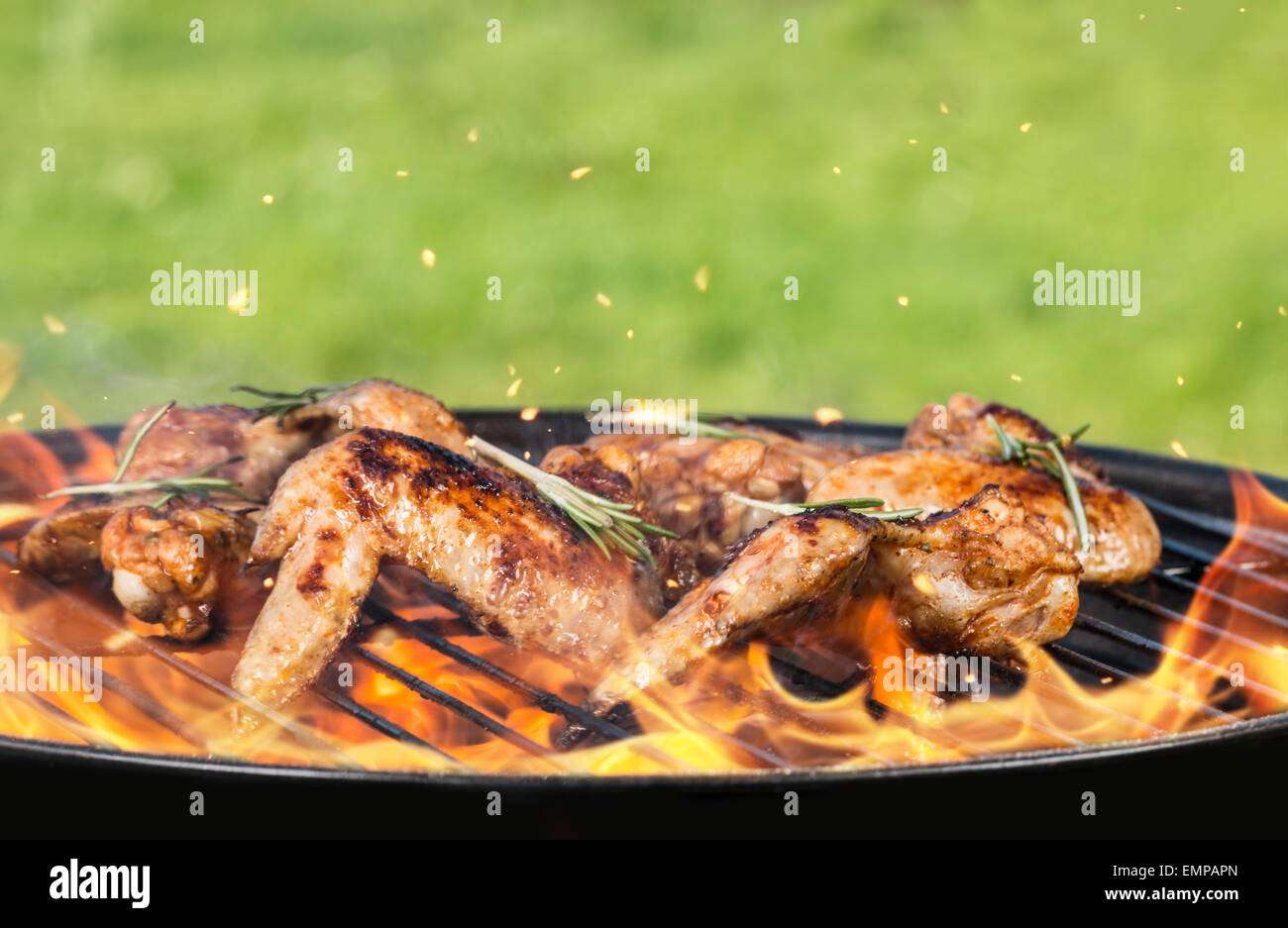 Chicken wings on grill Stock Photo - Alamy